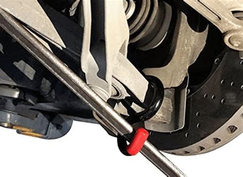 Pry Away With A Lower Control Arm Prying Tool