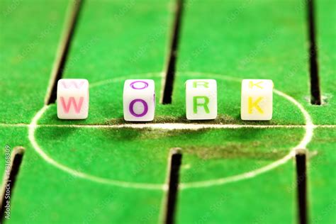 The Plastic Text Box Arrange To The Word Work On Green Color Background Represent Business