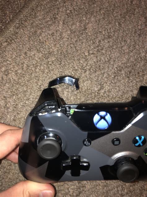 My LB Button Suddenly Came Off While Playing GTA Does Anybody Know How I Can Put This Back On My LB Button Suddenly Came Off While Playing GTA Does Anybody Know How I Can Put This Back On