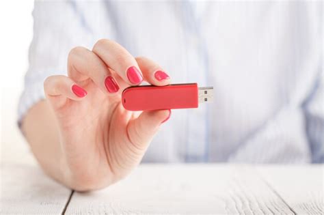 Premium Photo Female Hold Usb Stick Flash Drive