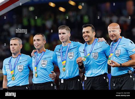 Referee Team Guided By Francois Letexier In The Middle And Szymon Marciniak First From The Right