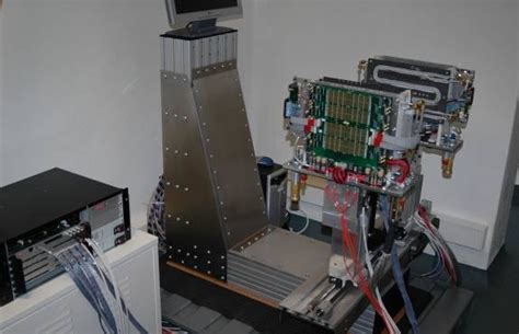 Photographs Of A The Clear Pem Scanner B The Supermodules And