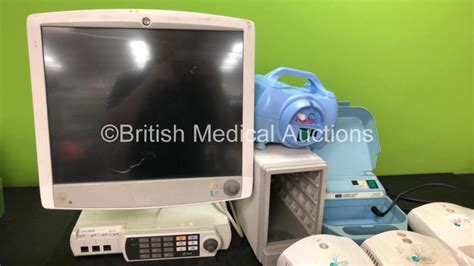 Mixed Lot Including 1 X Solar 8000m Module With 1 X Ge D19kt Monitor Powers Up 1 X Ge Tram Rac