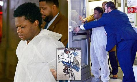 Homeless Man Carl Phanor Does Silent Perp Walk Wearing A Tyvek Suit