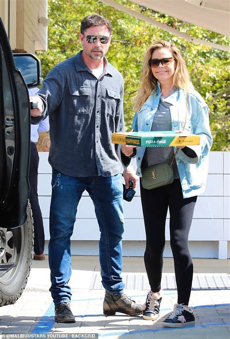 Denise Richards Shares A Sweet Smooch With Husband Aaron Phypers As