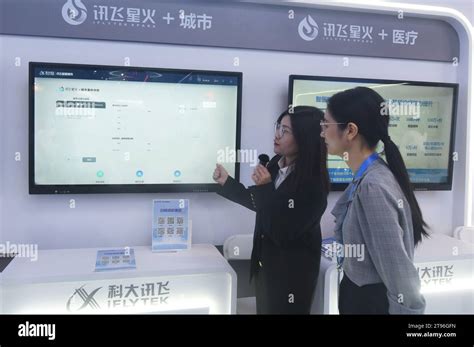 HANGZHOU CHINA NOVEMBER 23 2023 Visitors Watch The Application Of IFlytek Spark Grand