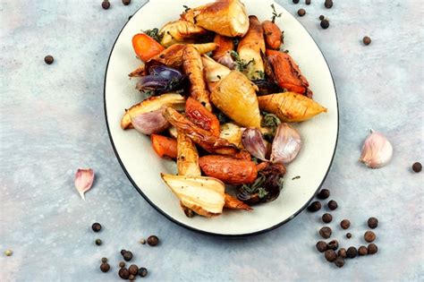 Premium Photo Baked Sliced Parsnip Root And Carrots