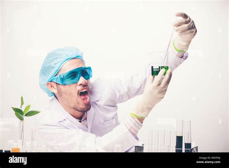 Conical Flask In Scientist Hand With Lab Glassware Background Laboratory Research Concept Stock