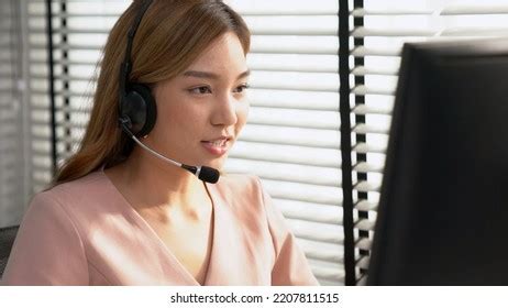 Competent Female Operator Working On Computer Stock Photo 2215623651 Shutterstock