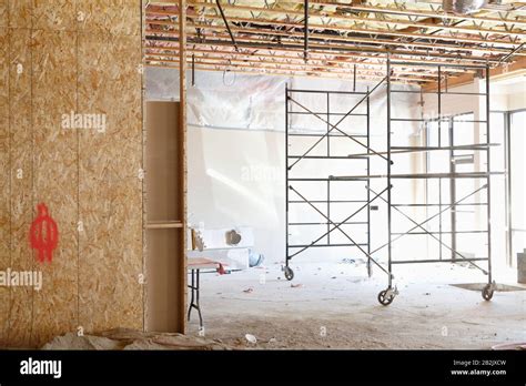 Scaffolding In A Empty Room At Construction Site Stock Photo Alamy