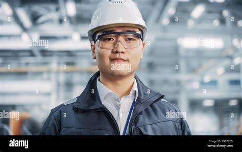 Portrait Of A Professional Asian Heavy Industry Engineer Smiling On