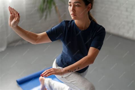 Free Photo High Angle Woman Practising Tai Chi