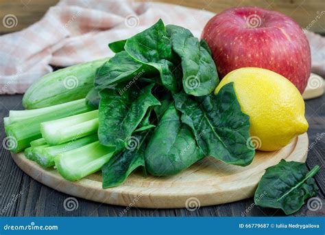 Ingredients For Green Smoothie With Celery Cucumber Spinach Apple And Lemon Stock Image
