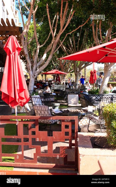 People Enjoying Lunch At Olive And Ivy Restaurant On The Waterfront In