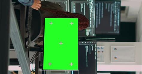 Vertical Video Team Of Programmers Working On Source Code With