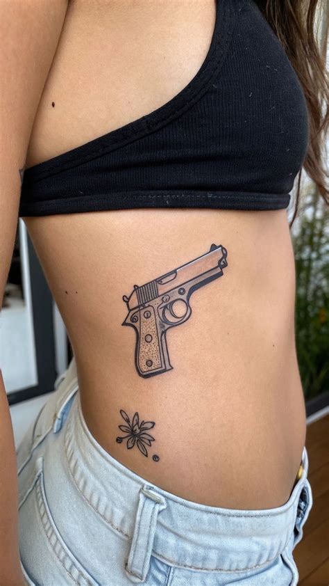 25 Gun Tattoo Ideas That Are Bold Stylish And Meaningful
