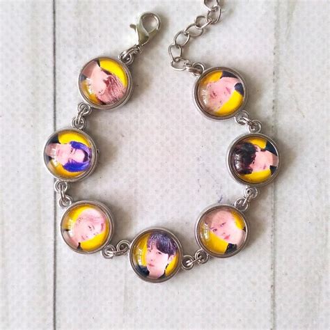 Браслет бтс Butter Bts жовтий фон — ціна 200 грн у каталозі Браслети