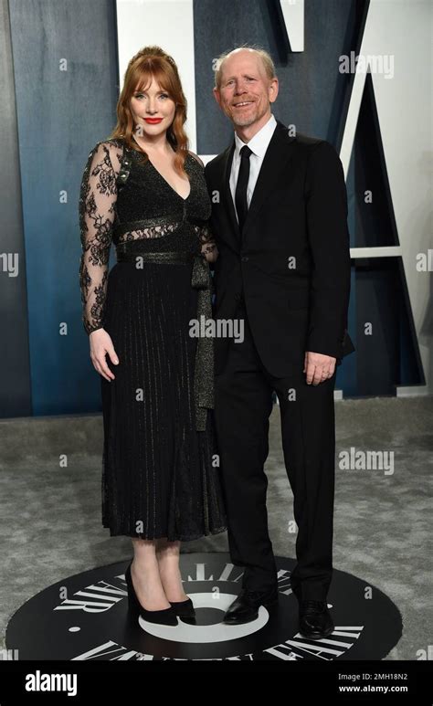 Bryce Dallas Howard Left And Ron Howard Arrive At The Vanity Fair