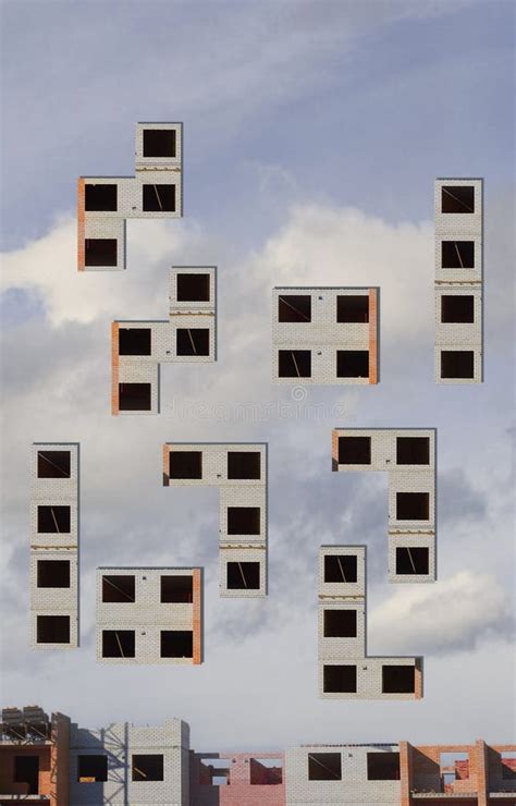 Construction Of Multi Storey Building Building House In Form Of Tetris On Blue Sky Background