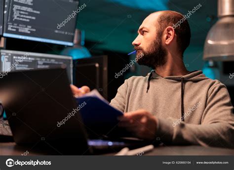 Web Developer Analyzing Source Code Papers Computer Taking Notes