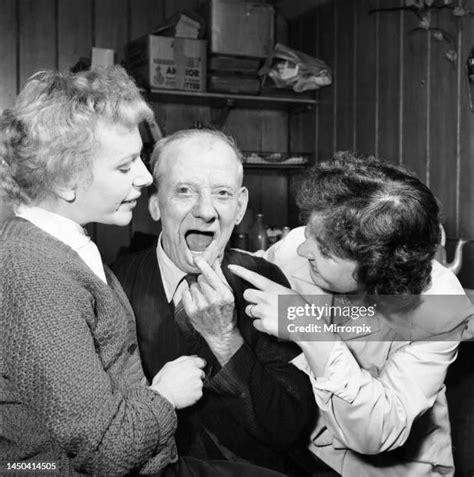 77 Year Old George Berry Shows Off His New Tooth July 1958 News Photo