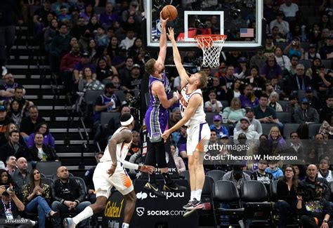 Domantas Sabonis Of The Sacramento Kings Slam Dunks Over Jock Landale
