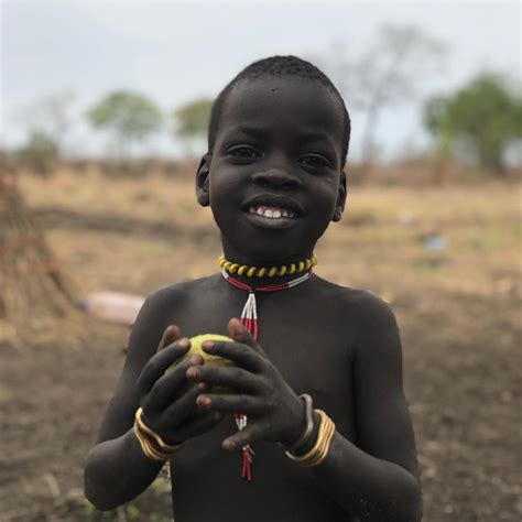 Cute Girl From Mursi Tribe Round Omo Valley Tour