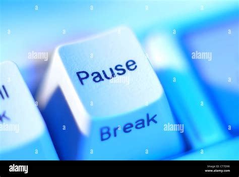 Blue Illuminated Pause Break Key On A Keyboard Stock Photo Alamy