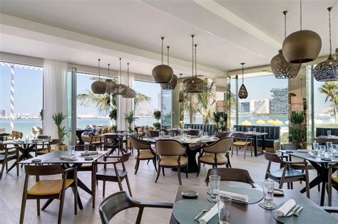 The Beach Bar And Grill Dubai Beach Club Sunbeds Info And Reservations