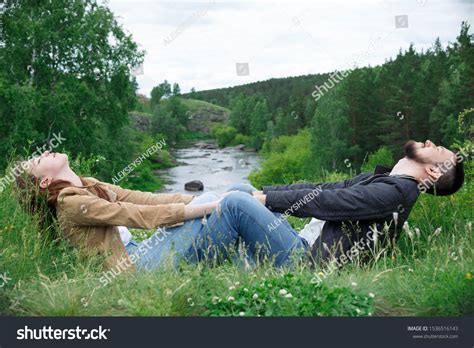 Woman Man Hold Hands Crossed Legs Stock Photo Edit Now