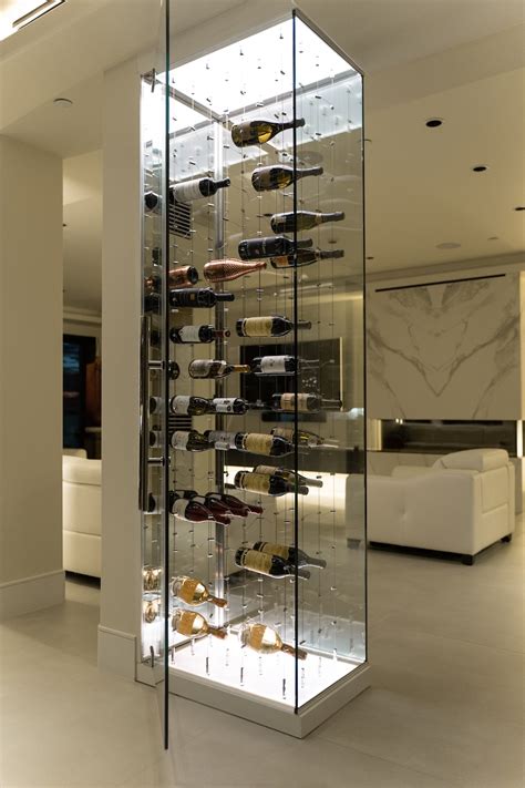 Explore Modern Glass Wine Cellars Starting With This Artful Example