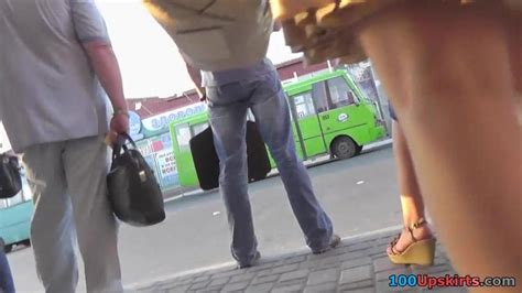 G String Upskirt Footage Of A Redhead On A Bus Stop