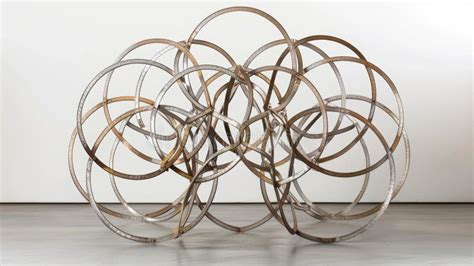 A Wire Sculpture Of Eight Intersecting Circles Creating A Beautiful And