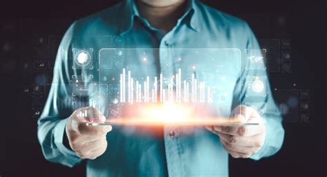 Businessman Or Analyst Working With Business Analytics And Data Management System On Virtual