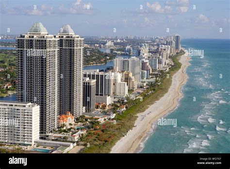 An Aerial View Of The Beach And Ocean In Miami Florida With Buildings