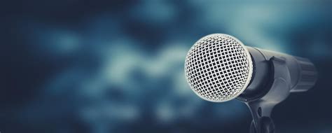 Premium Photo Microphone With Stage Light Background For Performance Concept Of Speech Comment