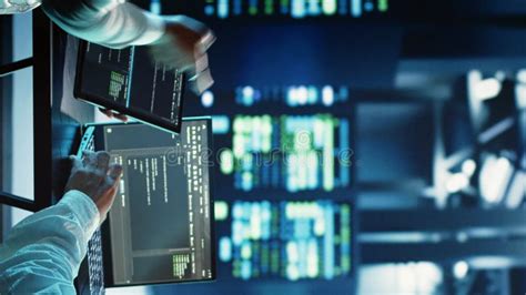 Vertical Video Colleagues Programming In Data Center Stock Footage