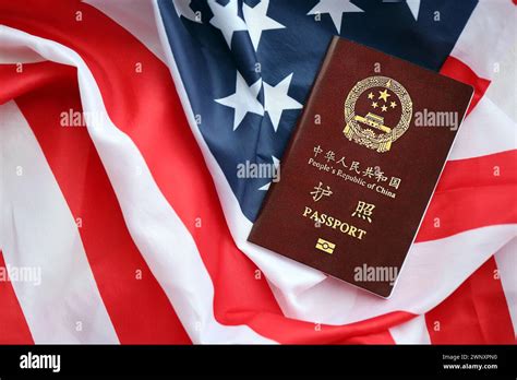 Red Passport Of People Republic Of China On United States Flag Prc