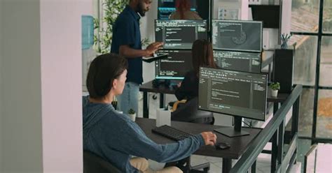 Database Programer Writing Code On Computer In Software Company Office Stock Video Envato