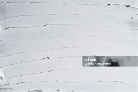 화이트 크림 질감 얼굴 모이스처라이저 스와이프 클로즈업 바디 로션 마스크 또는 자외선 차단제 스킨케어 미용 제품 핸드 크림 배경입니다 스킨 케어 샘플 화장품 얼룩 배경입니다