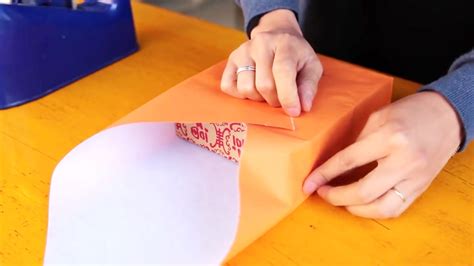 کادو کردن هدیه در 15 ثانیه با کمترین میزان چسب و کاغذ