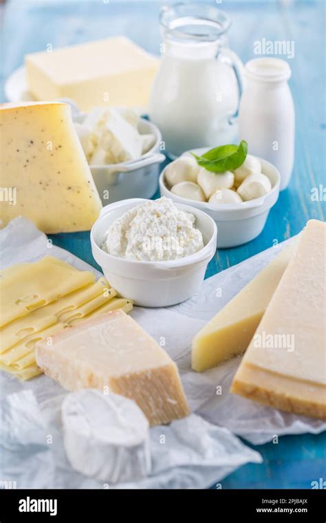 Different Types Of Dairy Products On Wooden Background Stock Photo Alamy