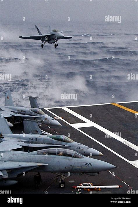 Us Navy An F A 18f Super Hornet Lands On The Flight Deck Of Uss