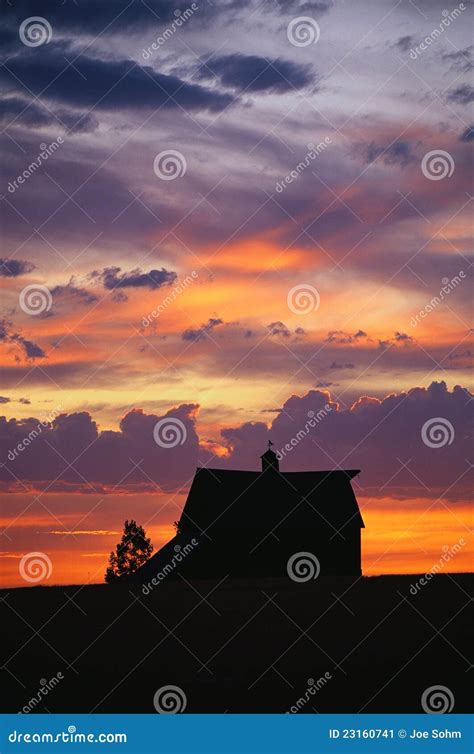 Silhouette Of A Farm At Sunset Stock Image Image Of Sundown Colorful
