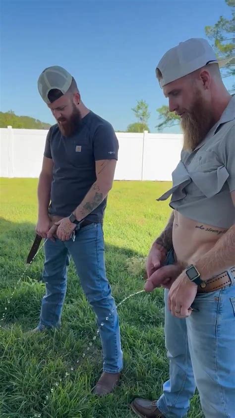 Two Redneck Taking A Piss Side By Side