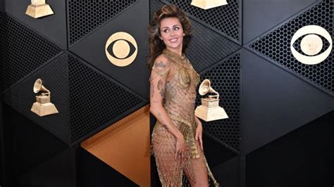 Miley Cyrus Wears A Naked Dress Made Of Gold Safety Pins At The 2024