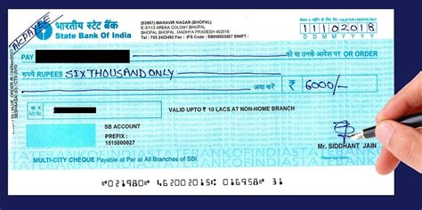 Sbi Fined Rs 85000 For Dishonouring Cheque After Failing To Read