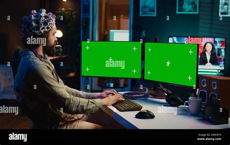 Engineer With EEG Headset On Programming Brain Transfer Into Computer Virtual World On Isolated