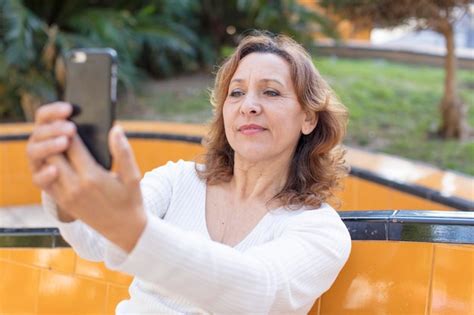 Premium Photo Model Using A Smart Phone