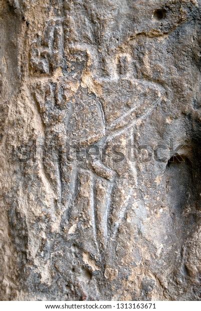 Naked Man With Erected Penis And Woman Prehistoric Petroglyphs Rock